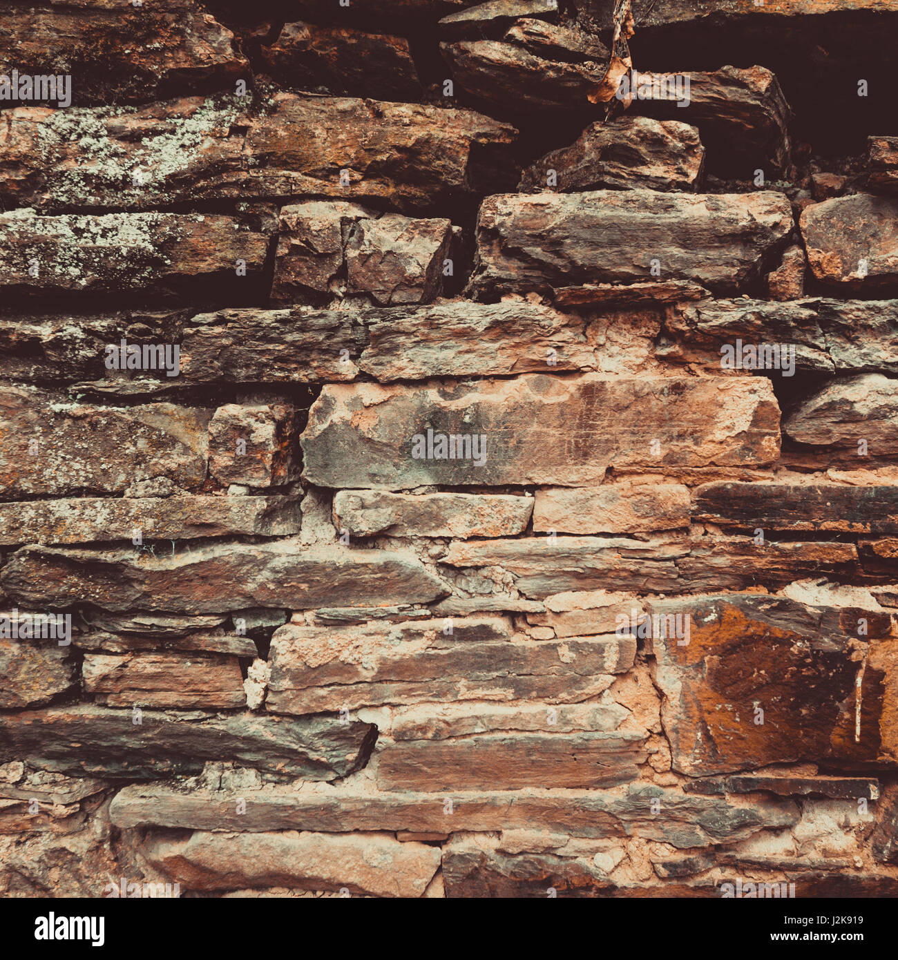 old stone wall. pattern of decorative slate stone wall surface ...