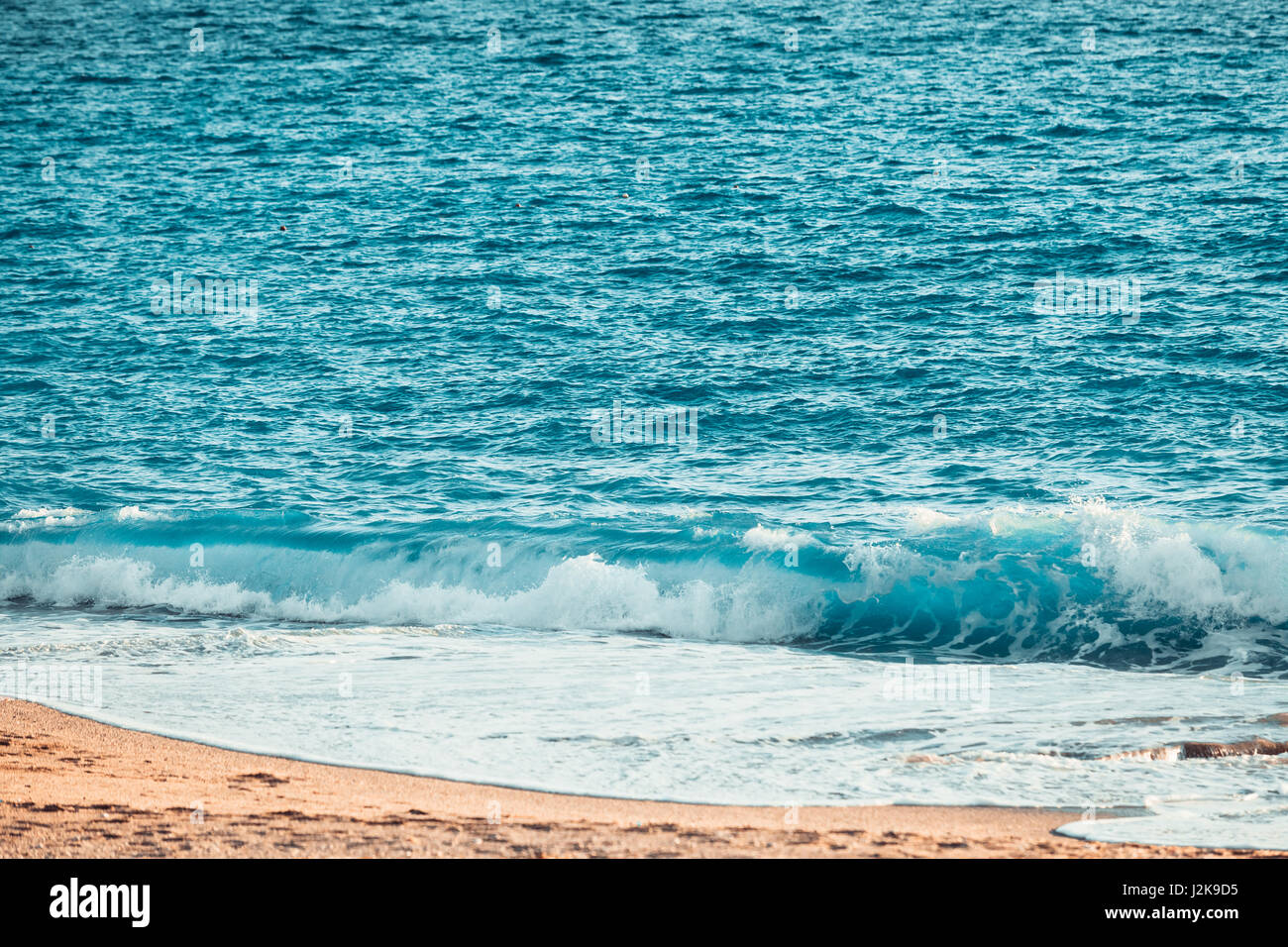Blue sea with waves Stock Photo - Alamy