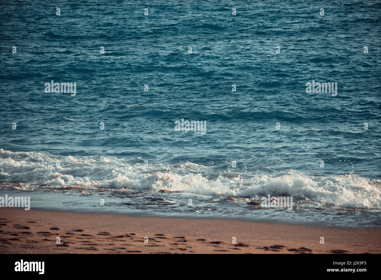 Blue sea with waves Stock Photo - Alamy