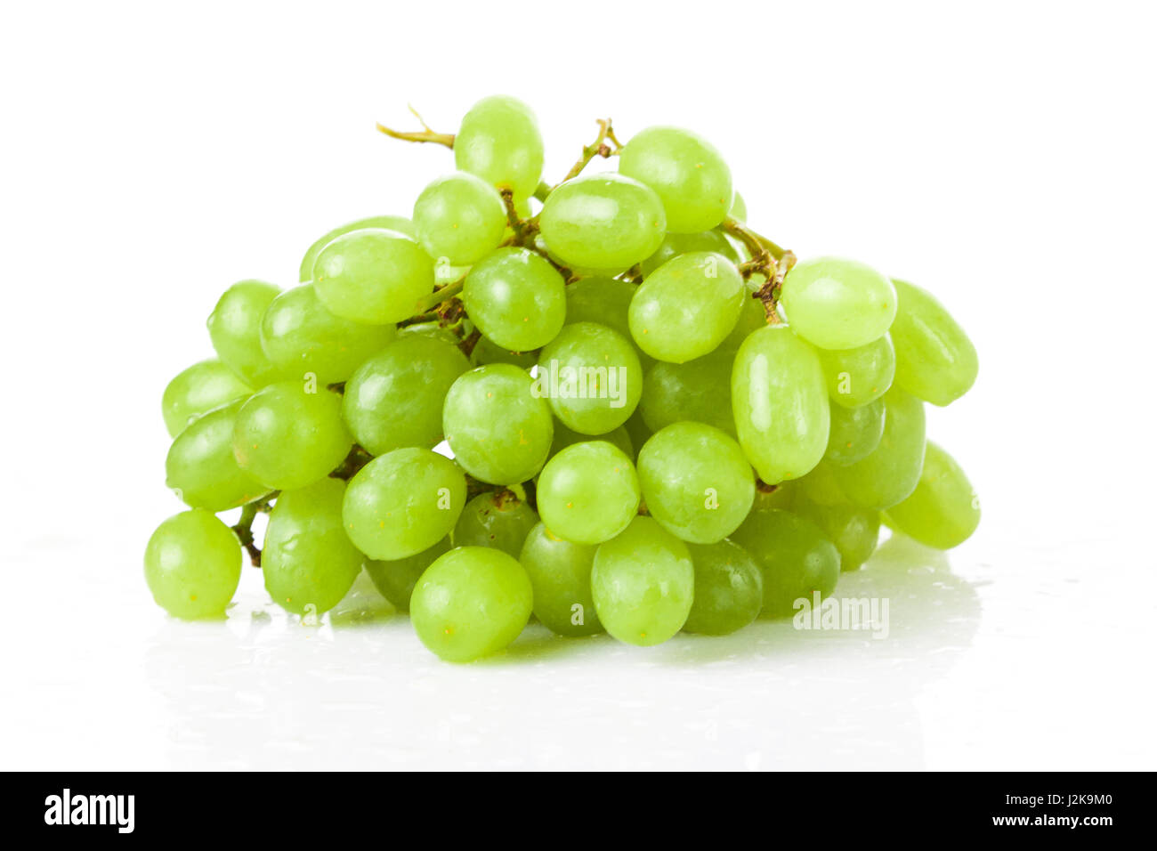 Fresh green grapes on white background Stock Photo - Alamy