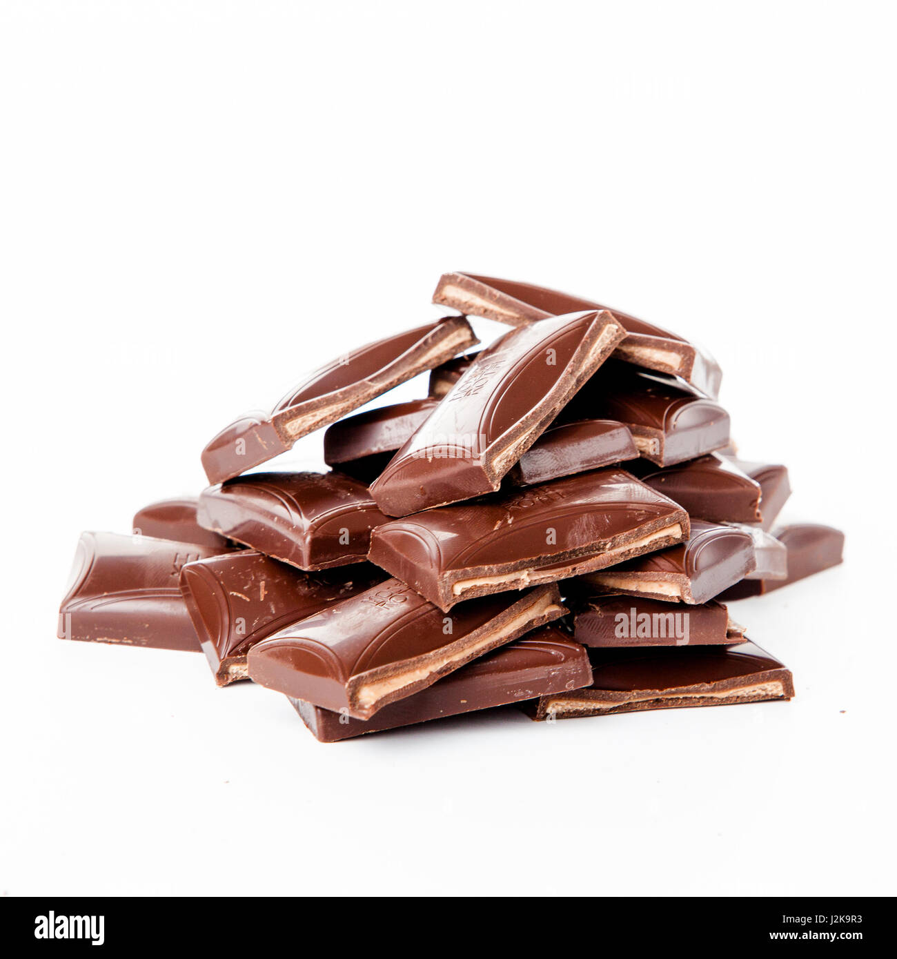 Chocolate bars stack isolated on white background. Chocolate blocks ...