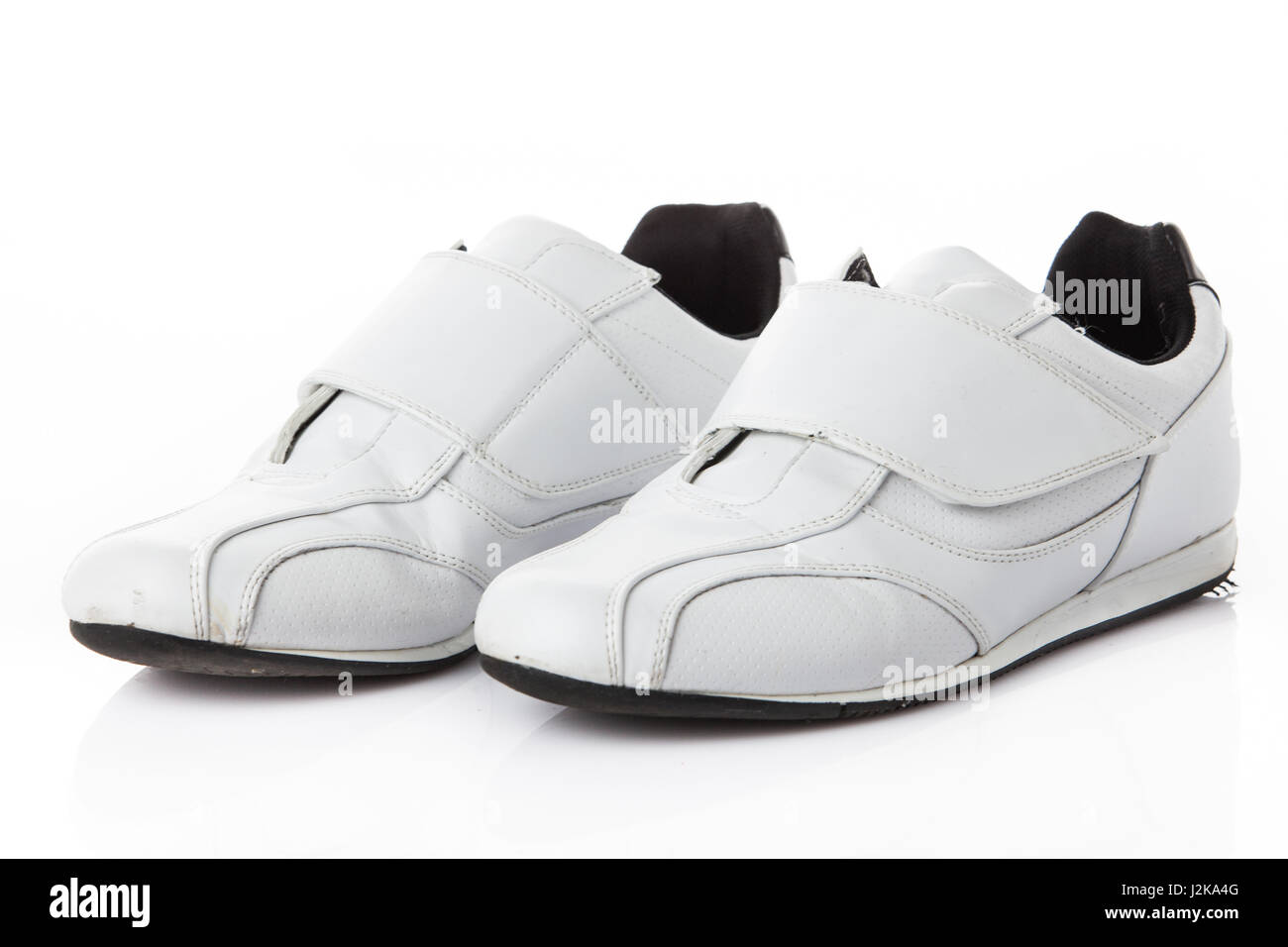 White Sport shoes isolated on white Stock Photo - Alamy