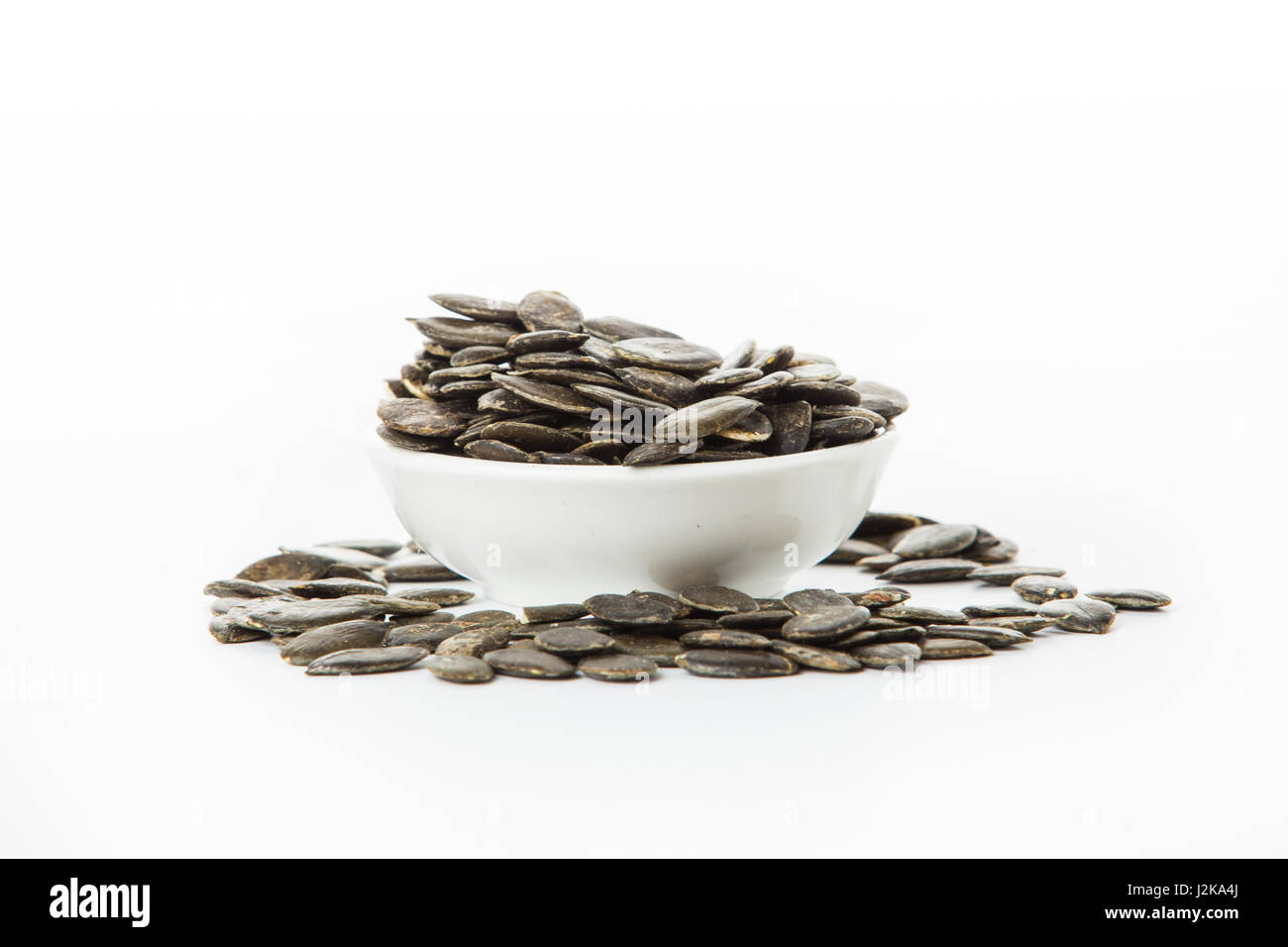 pumpkin seeds isolated on white background. Fresh roasted Pumpkin Seeds ...