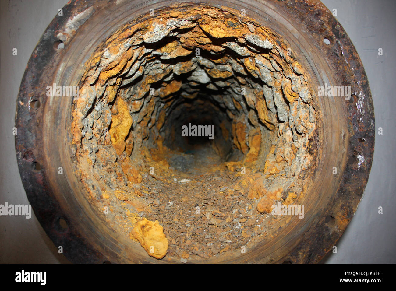 Metal erosion. Pipe in section. abandoned building. Photo for your ...