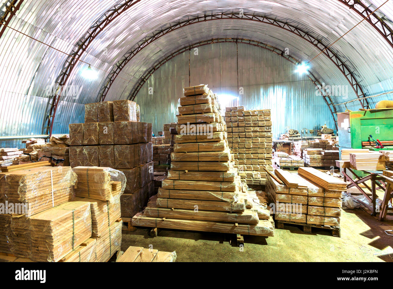 Warehouse packed with variety of timber for construction and repair ...