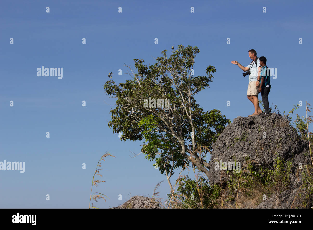 Atauro island, East Timor. A tourist and guide Stock Photo - Alamy