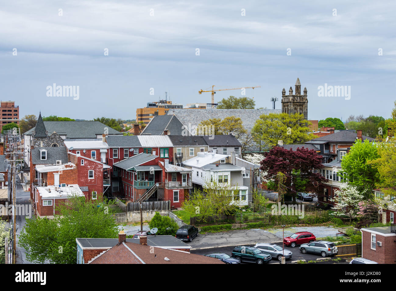 Aerial of historic downtown Lancaster, Pennsylvania with blooming trees ...