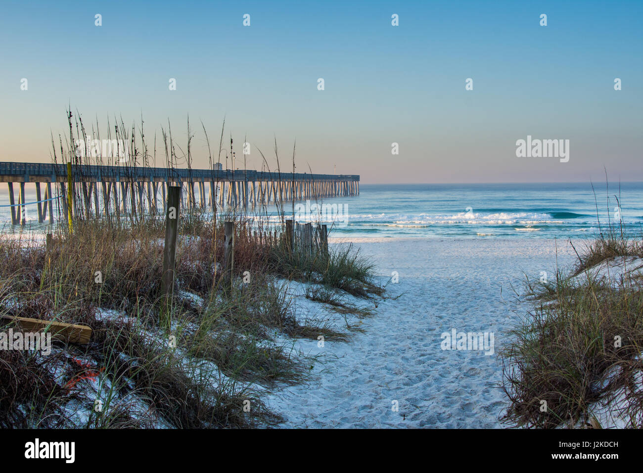 Sandy Panama City Beach Pier at Sunrise in Panama City, Florida Stock ...