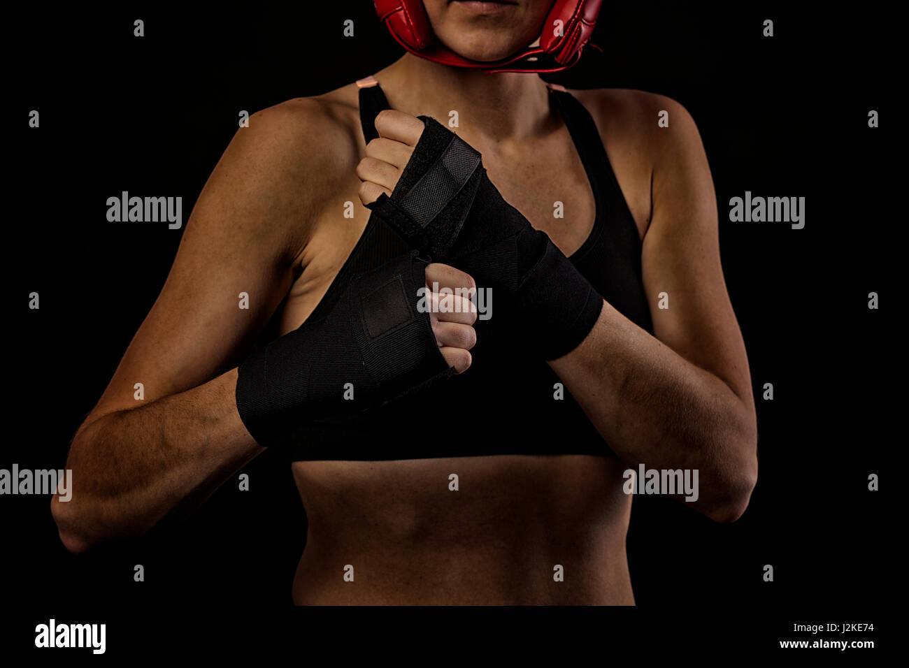 female boxer wrapping hands with boxing tape Stock Photo - Alamy