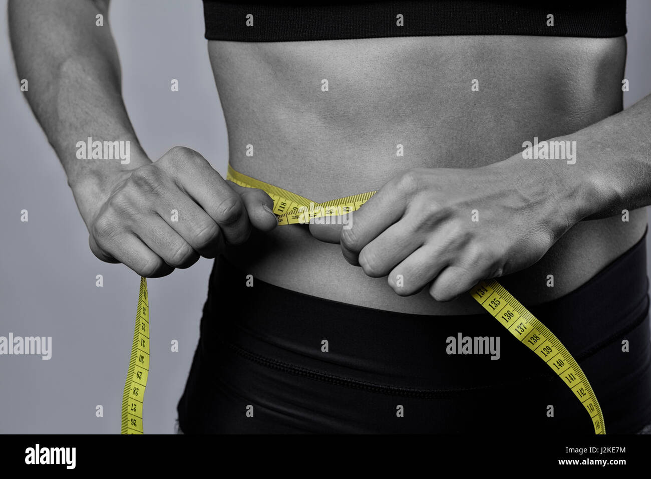 fit woman measuring waist Stock Photo - Alamy fit woman measuring waist Stock Photo - Alamy