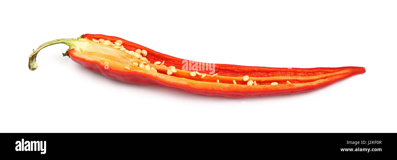One cut half of fresh red hot chili pepper isolated on white background ...