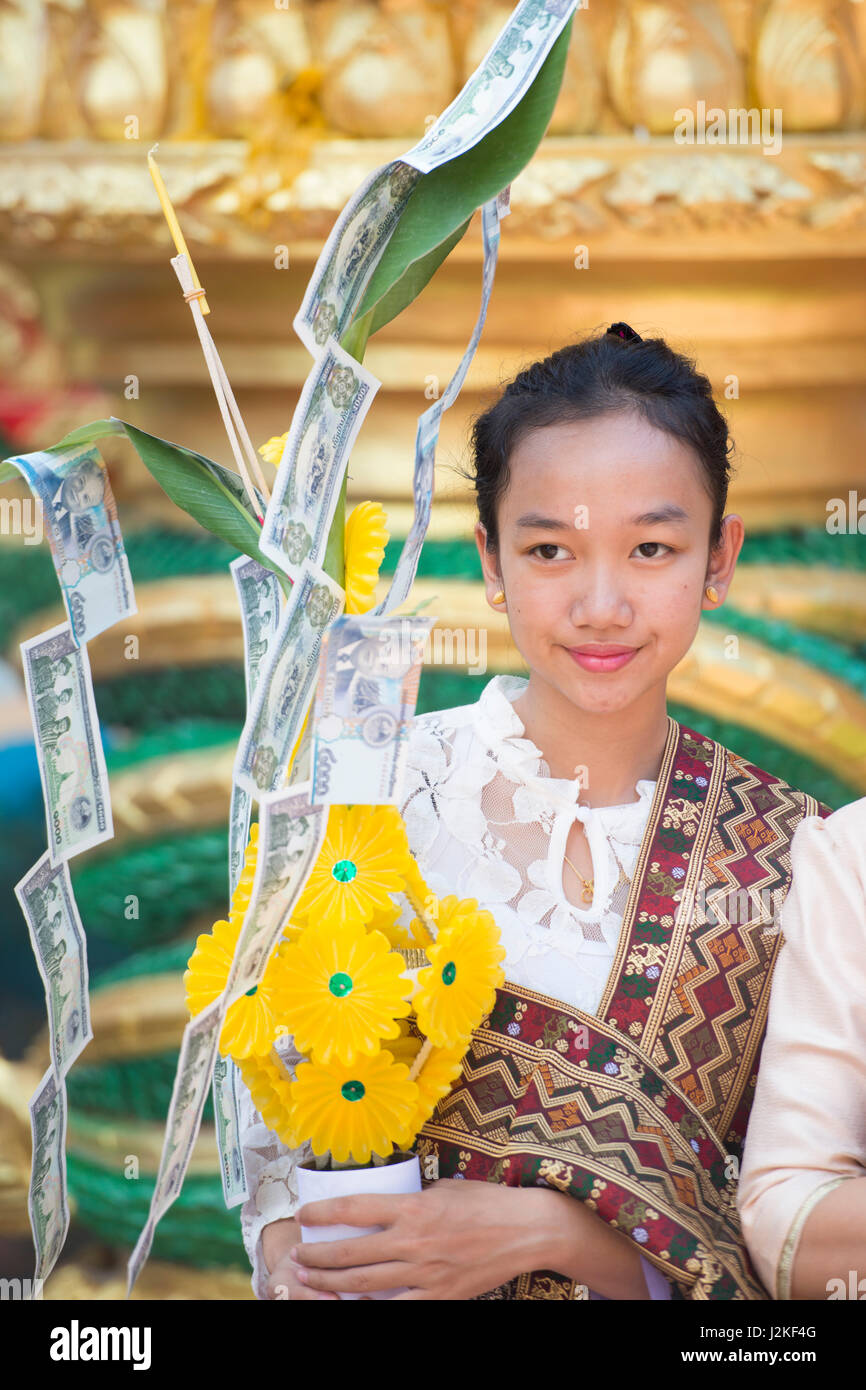 wax castle at a ceremony at the Wat Si Muang Temple on the That Luang ...