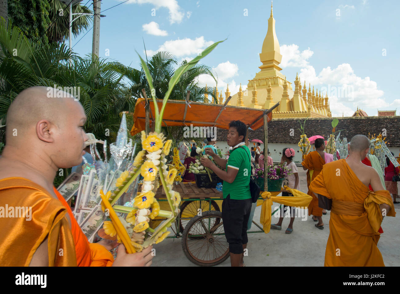 a shop at a ceremony at the Pha That Luang Festival in the city of ...