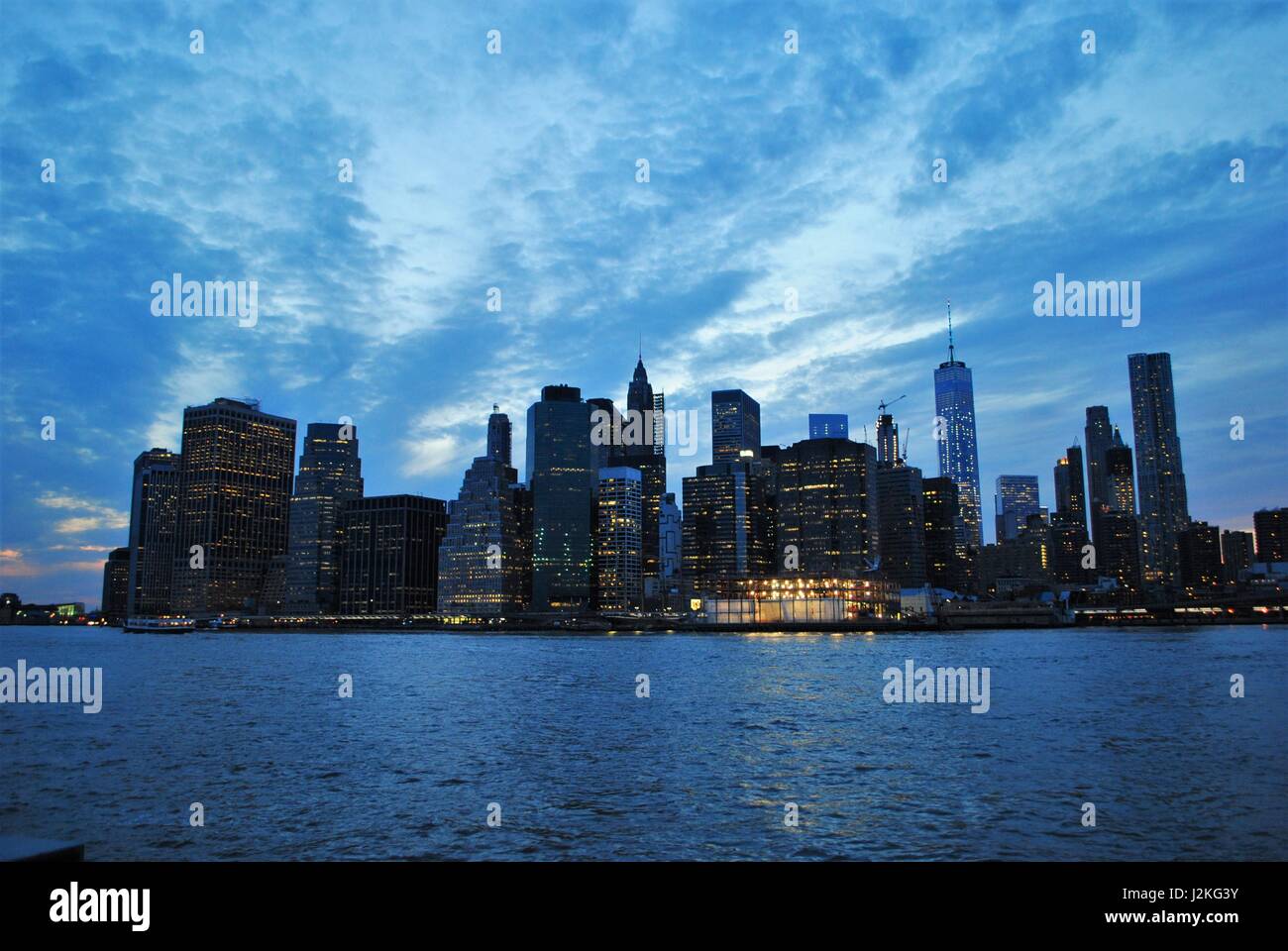 The Lower Manhattan sunset view from the East River Stock Photo - Alamy