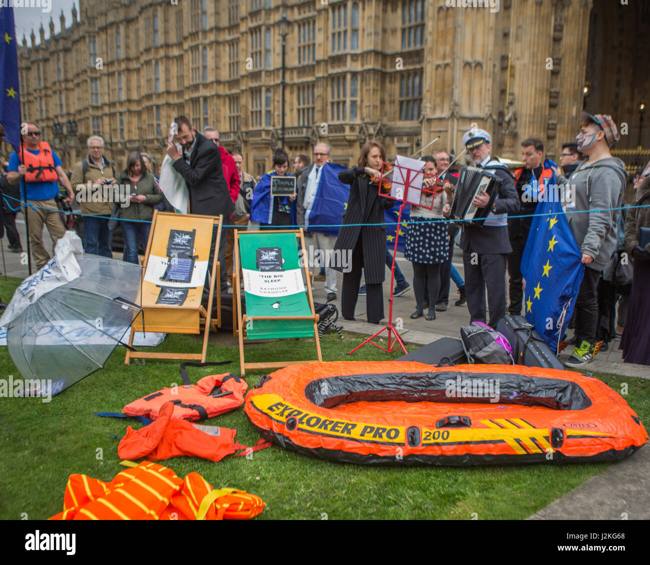 Anti Brexit supporters outside Parliament hold a Titanic themed article ...