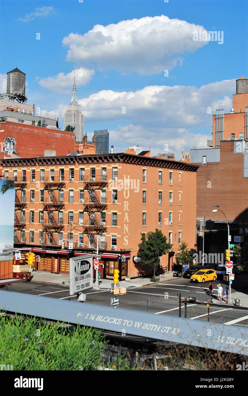 The elevated view to the Empite State Building from the High Line Park ...
