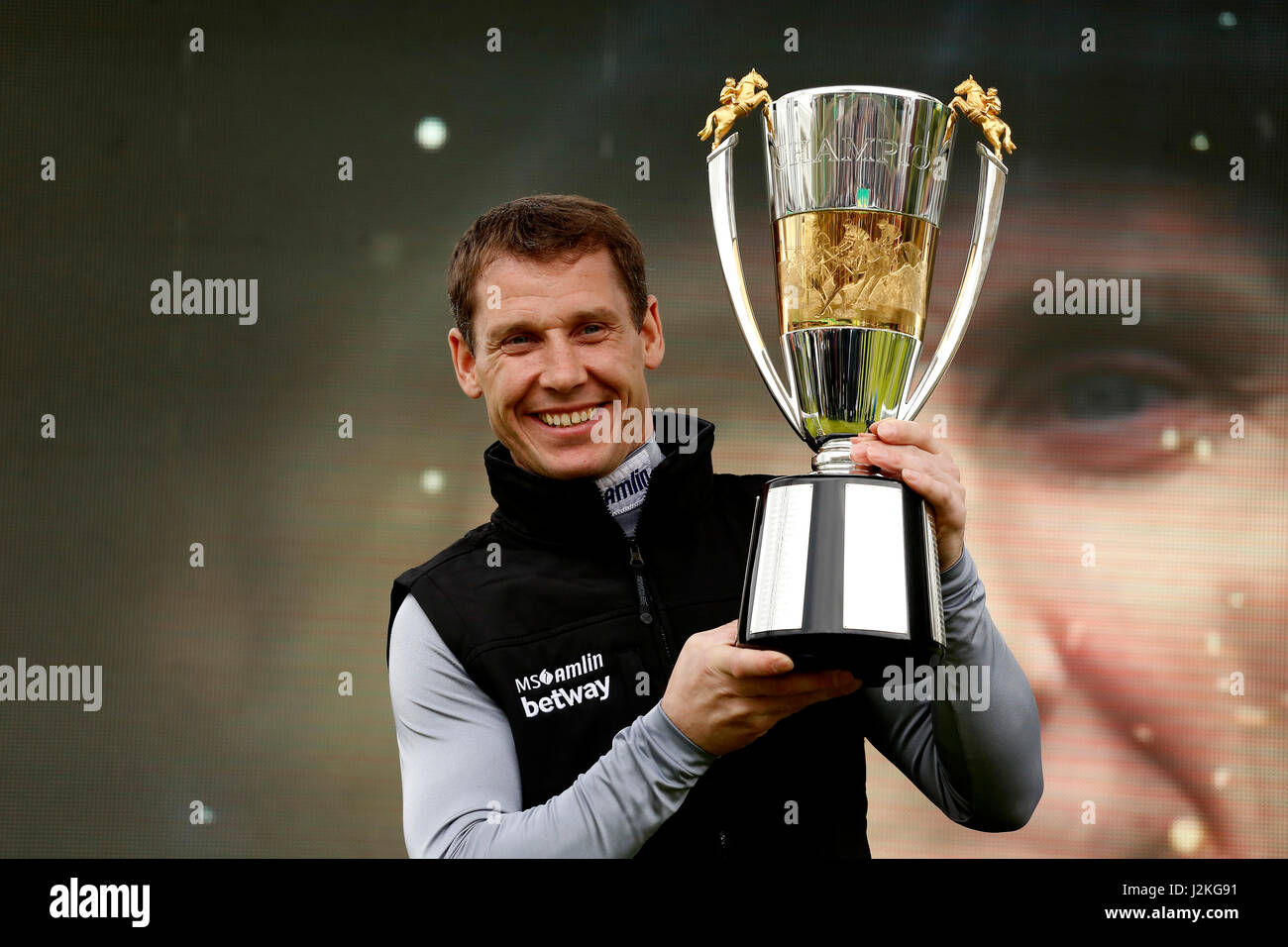 Richard Johnson with the Champion National Hunt Jockey Trophy after a ...