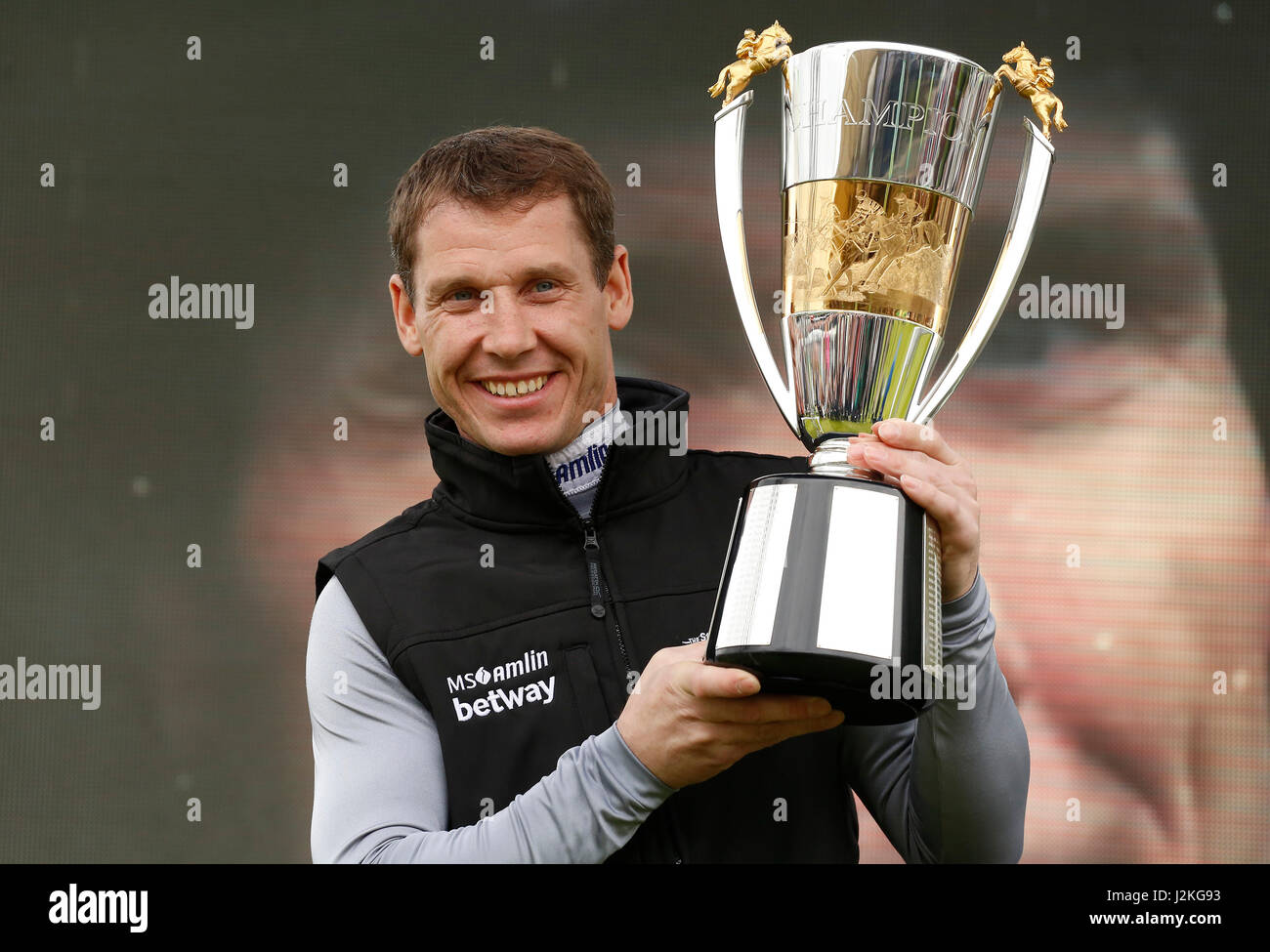 Richard Johnson with the Champion National Hunt Jockey Trophy after a ...