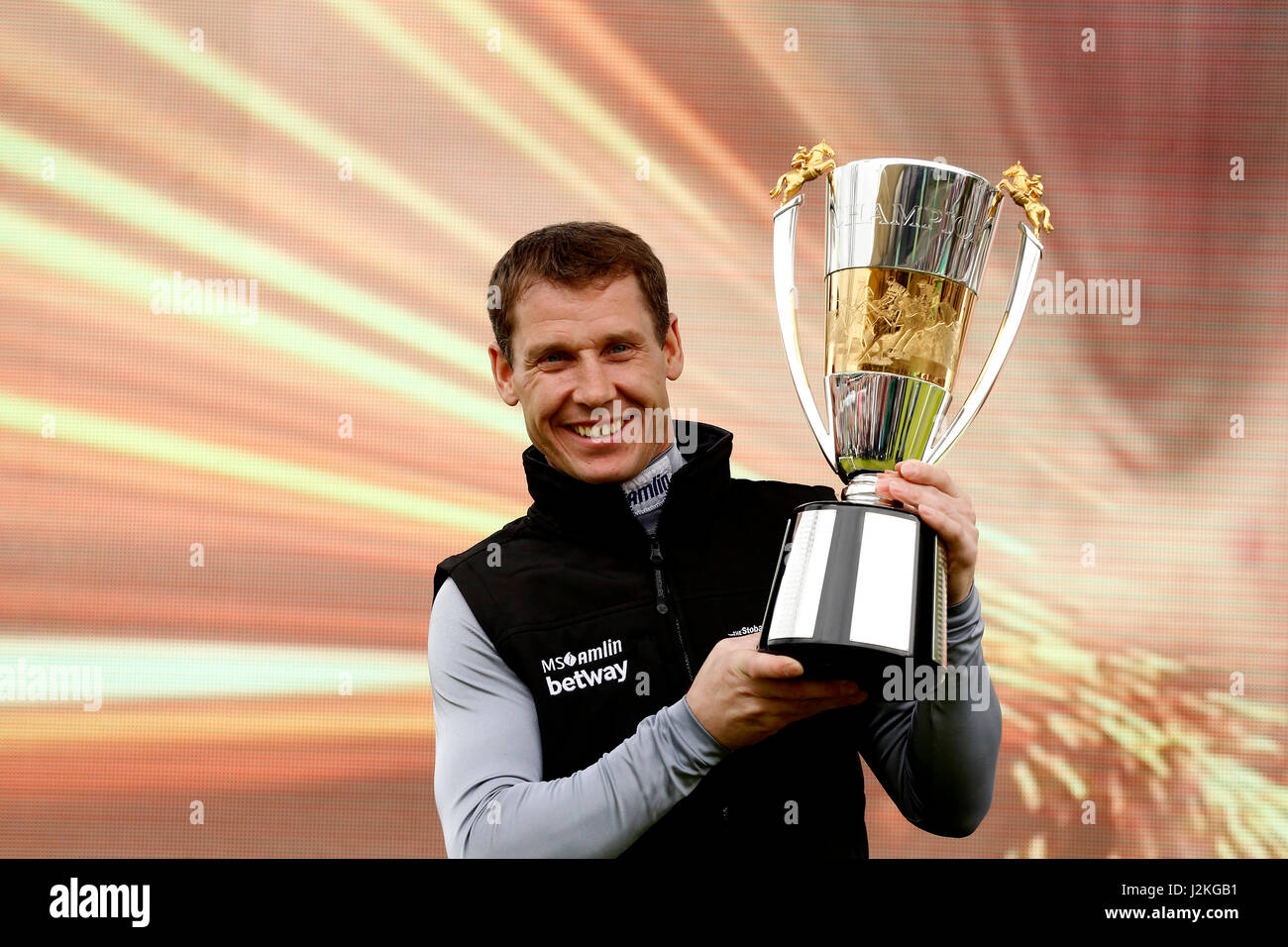 Richard Johnson with the Champion National Hunt Jockey Trophy after a ...