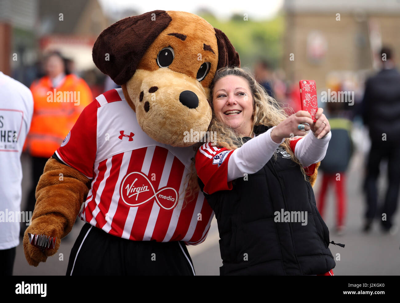 Southampton mascot Sammy the Saint poses for a selfie with a fan ahead ...