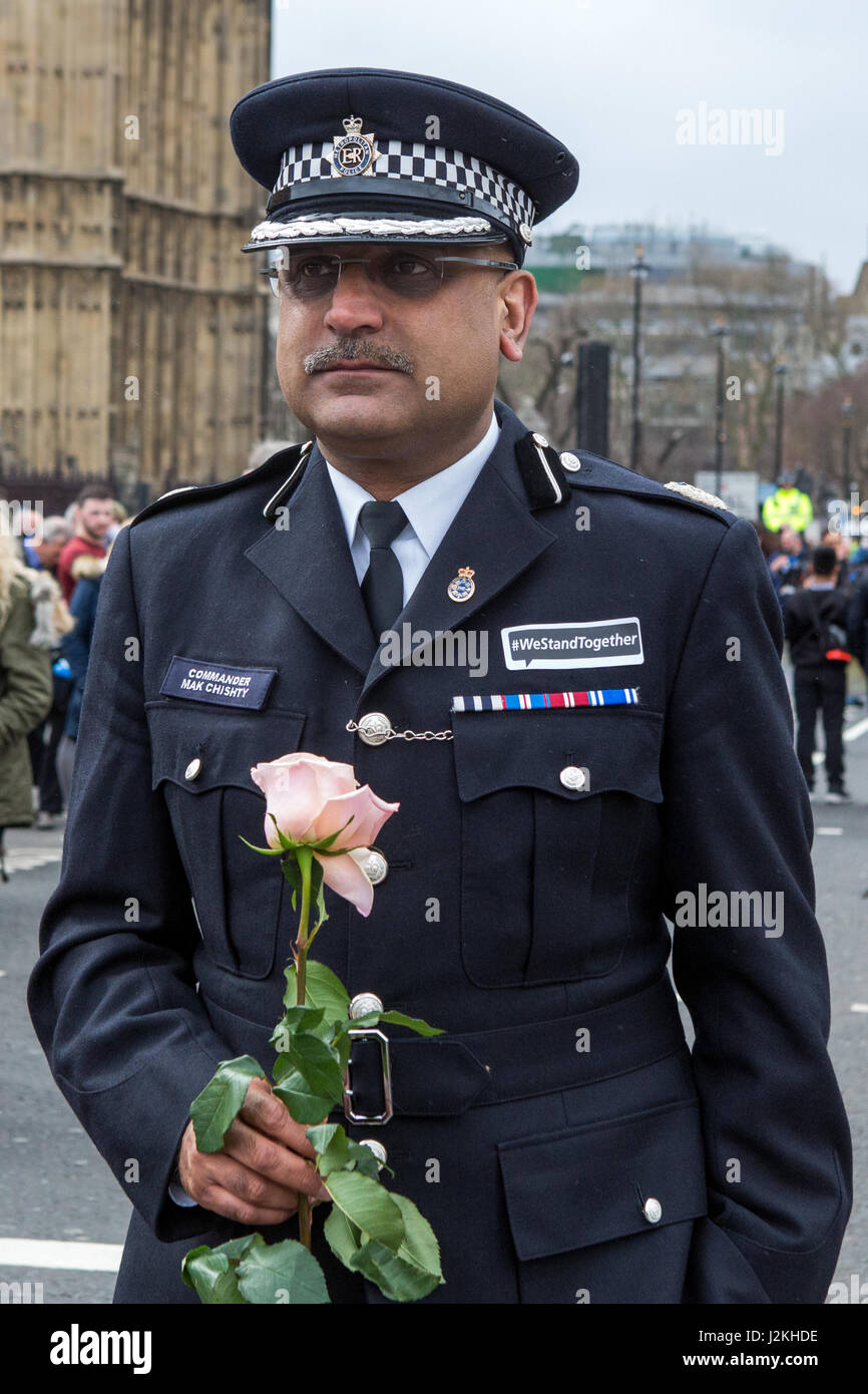 March of solidarity by police officers across Westminster Bridge, a ...