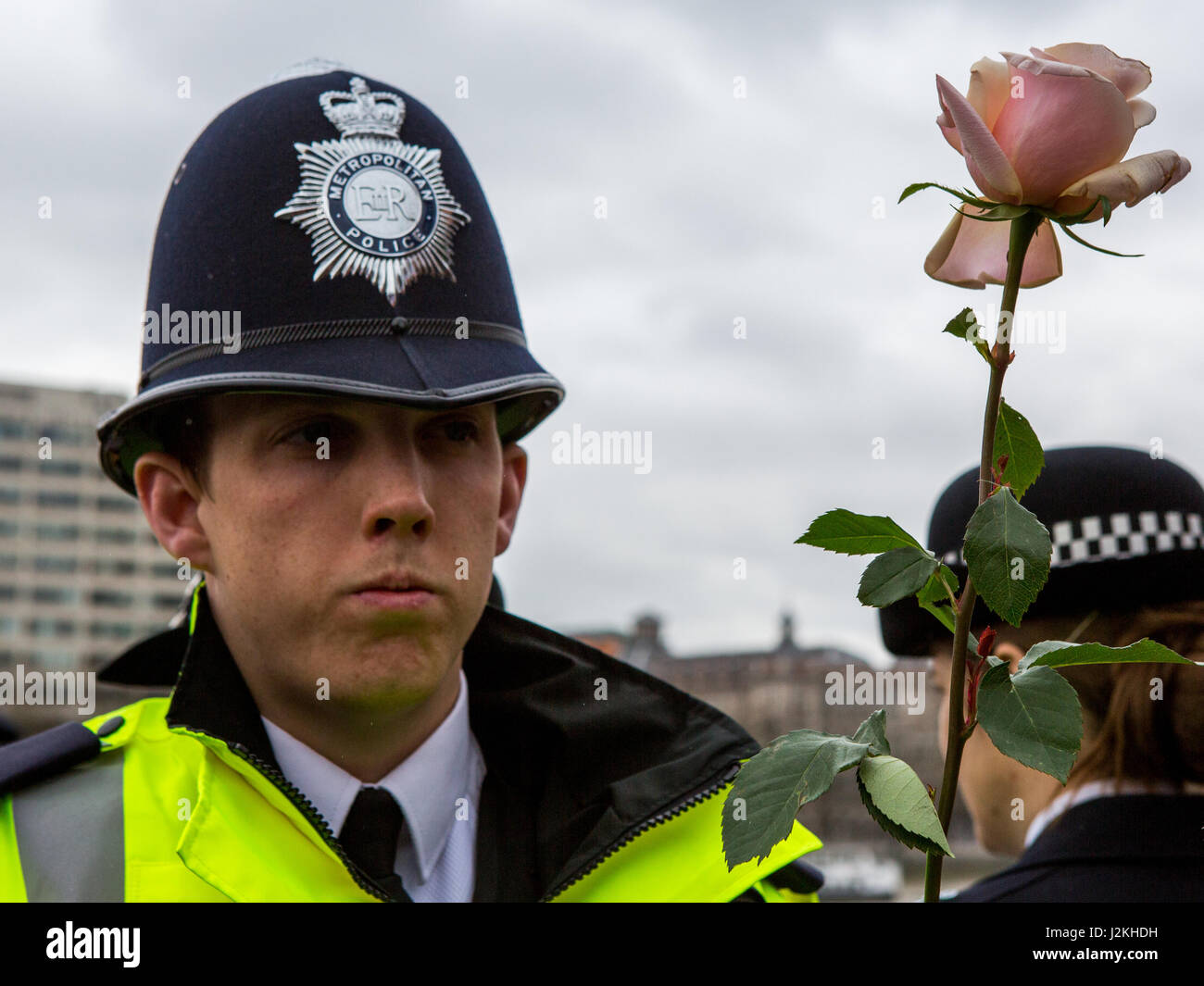 March of solidarity by police officers across Westminster Bridge, a ...