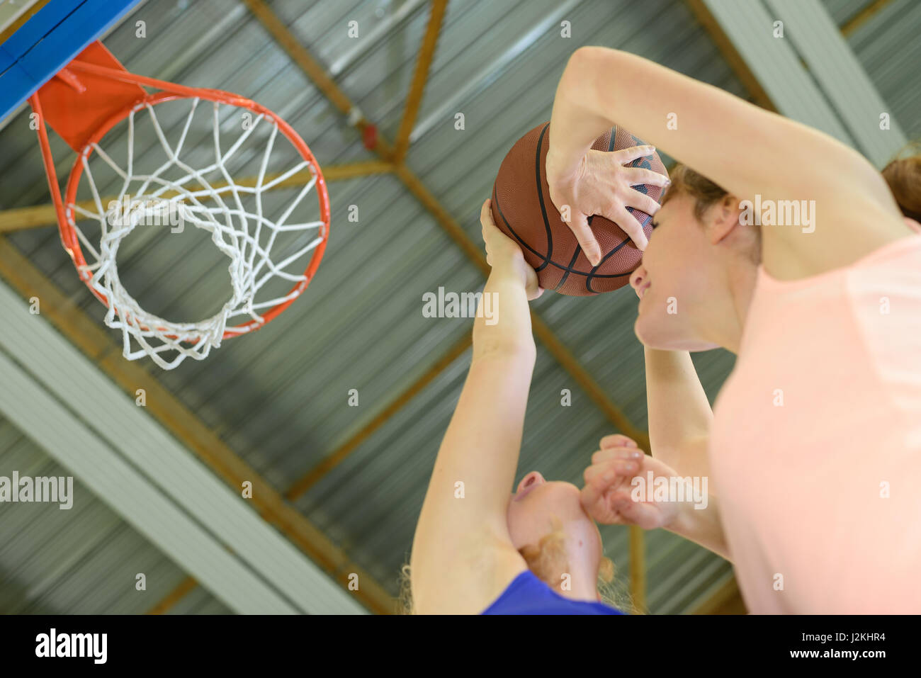 Women playing basketball Stock Photo - Alamy