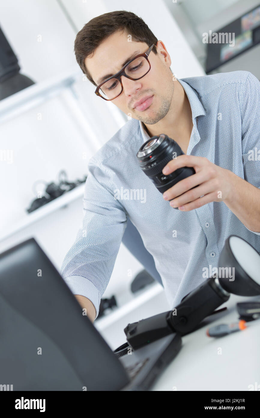 photographer looking at the lens Stock Photo - Alamy