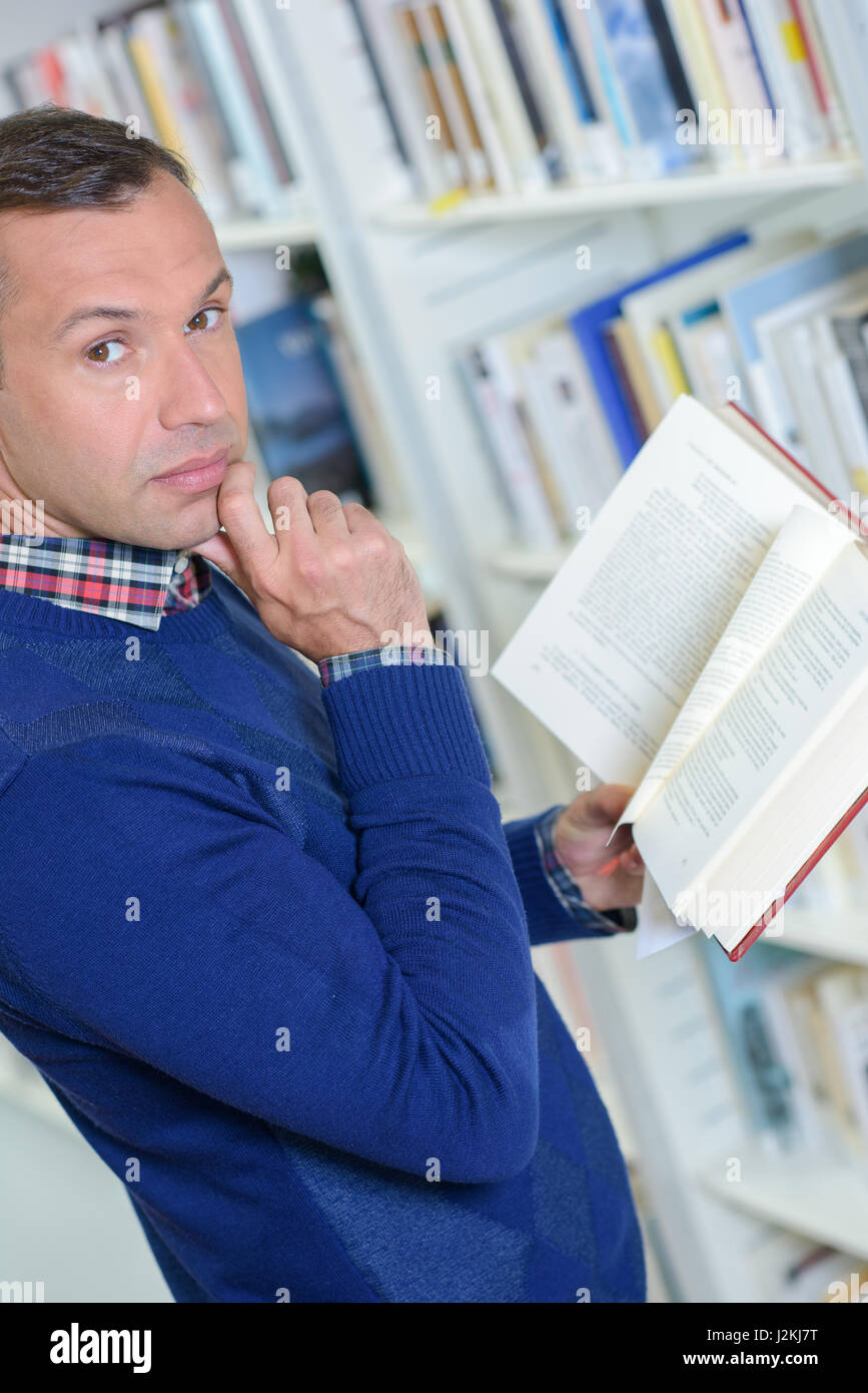 man reading a book Stock Photo - Alamy