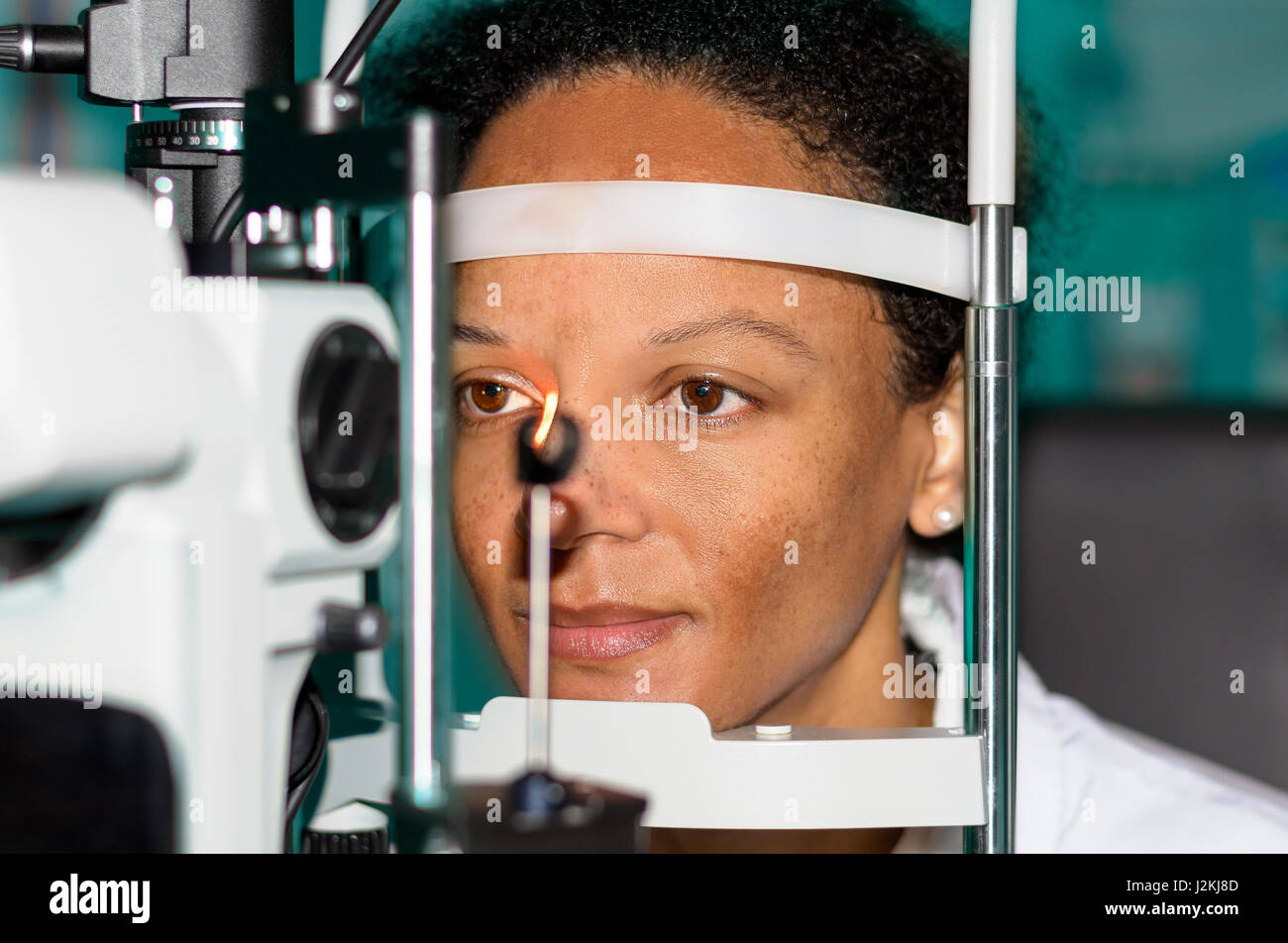 Young african woman at an optician in a hospital Stock Photo - Alamy