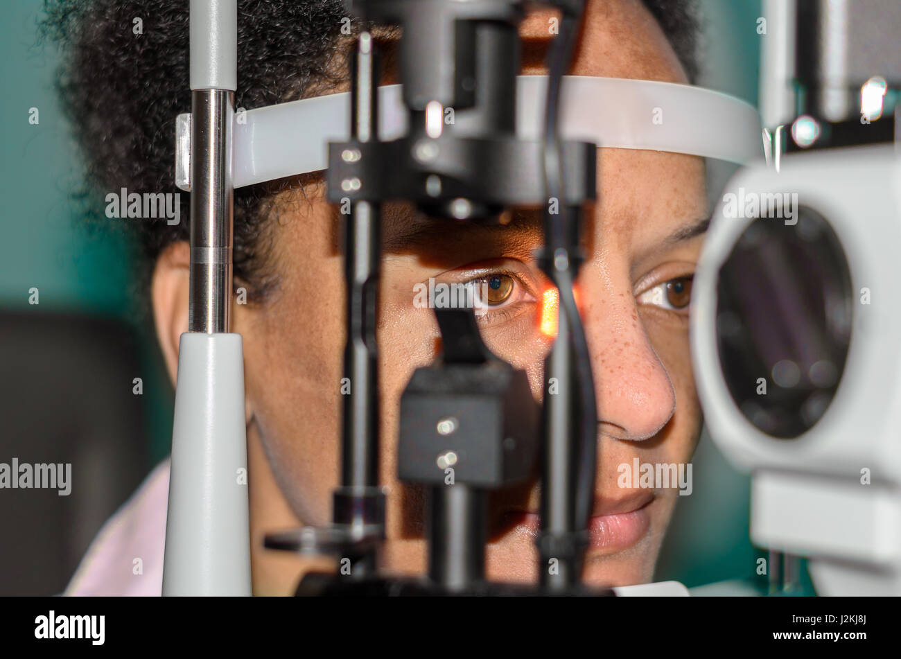Young african woman at an optician in a hospital Stock Photo - Alamy