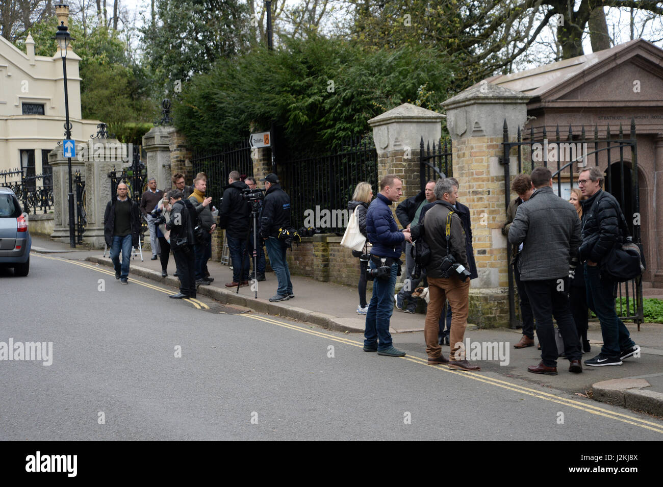 Photographers and film crews outside Highgate Cemetery for George ...