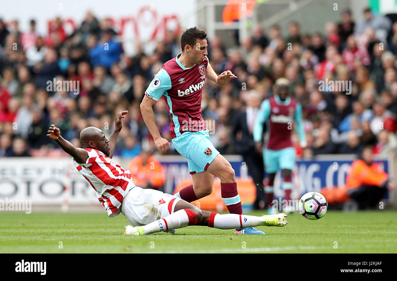 West Ham United's Jonathan Calleri (right) and Stoke City's Bruno ...