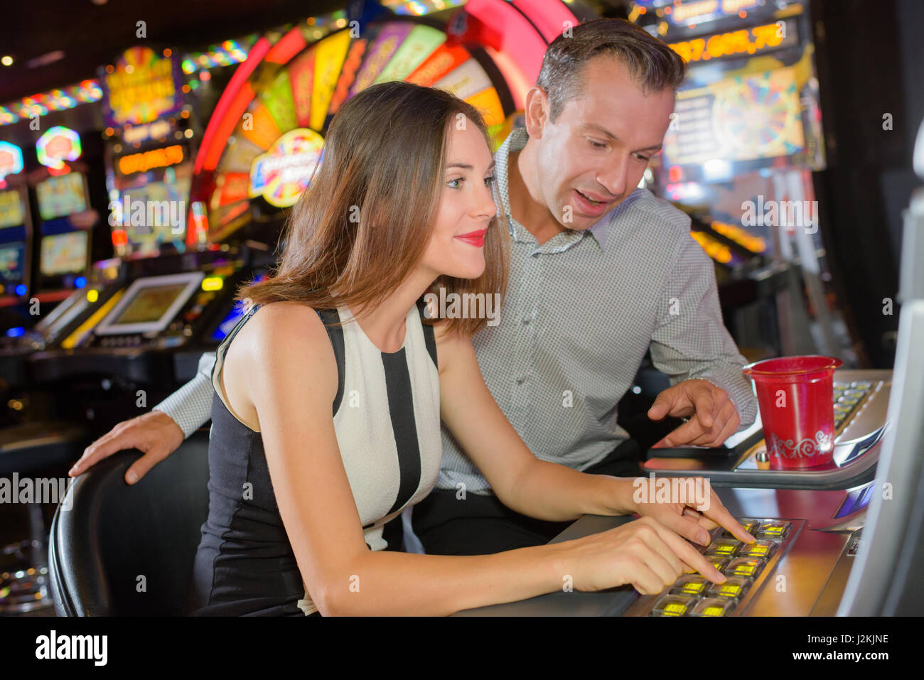 Coins in machine chance hi-res stock photography and images - Alamy