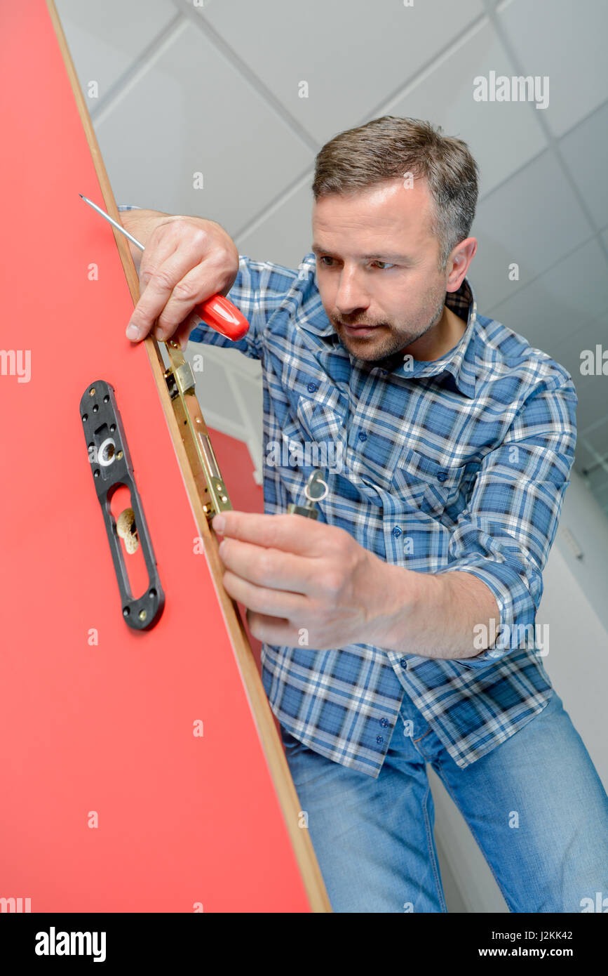 Replacing door lock hi-res stock photography and images - Alamy