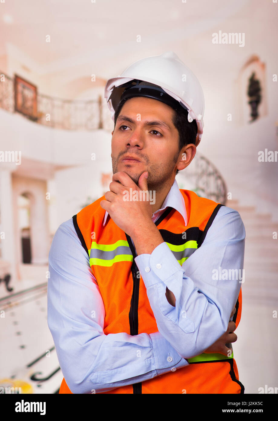 Engineer thinking at construction site Stock Photo - Alamy