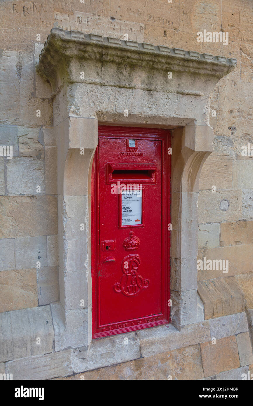small red postbox on the stone wall at Windsor Castle, England Stock ...