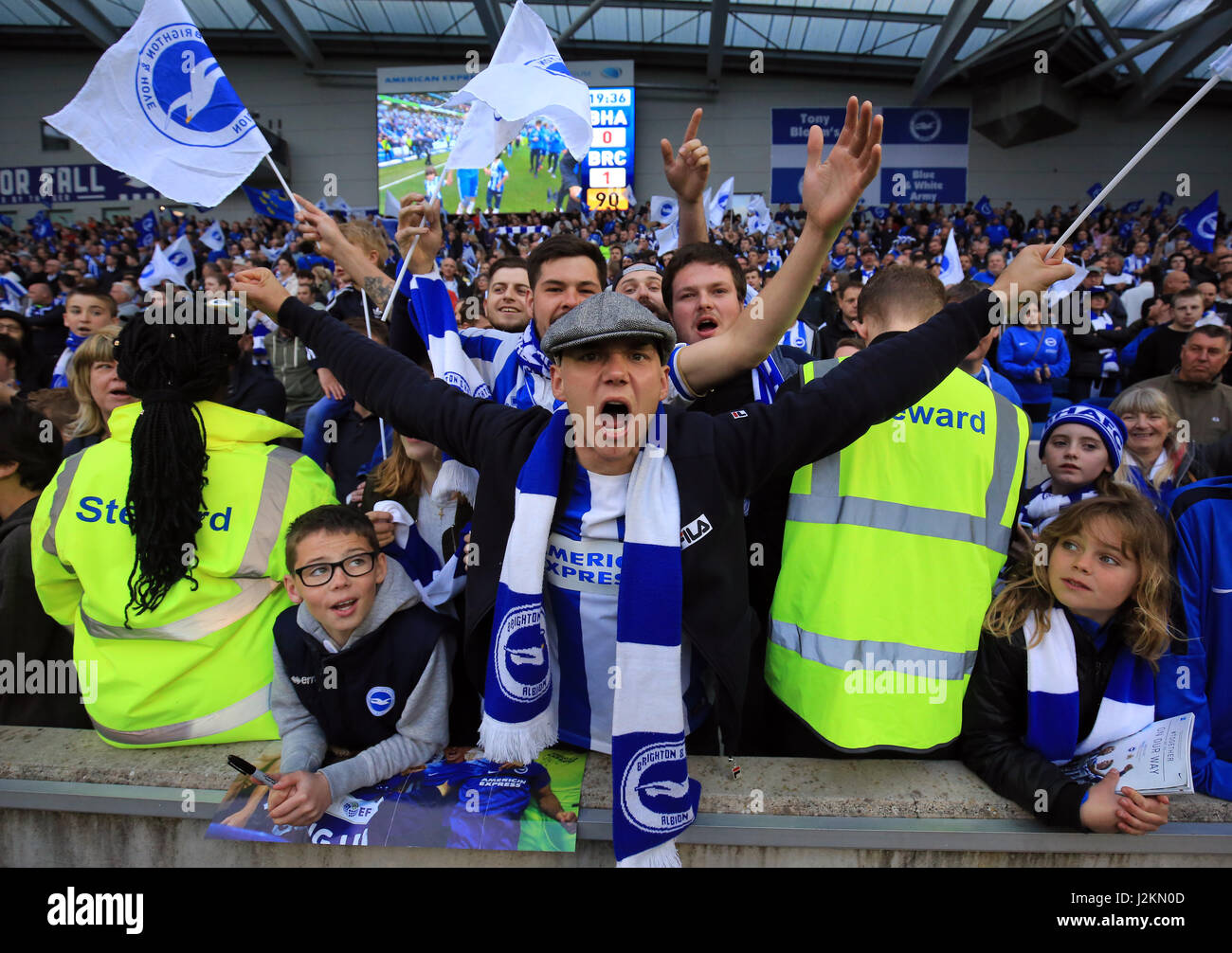 Brighton & Hove Albion fans celebrate promotion during a parade around ...