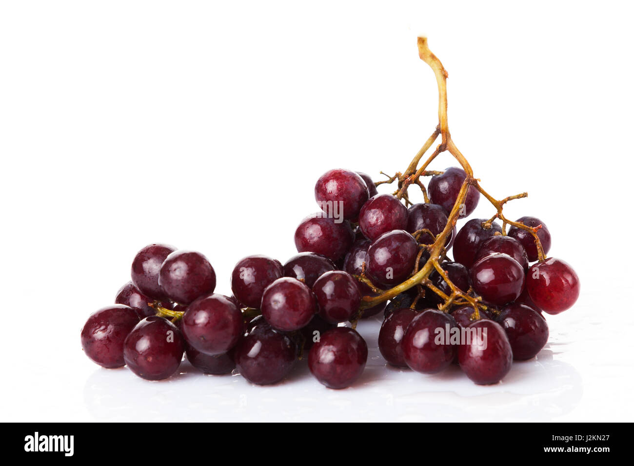 Fresh red grapes and water drops isolated on white background Stock Photo - Alamy