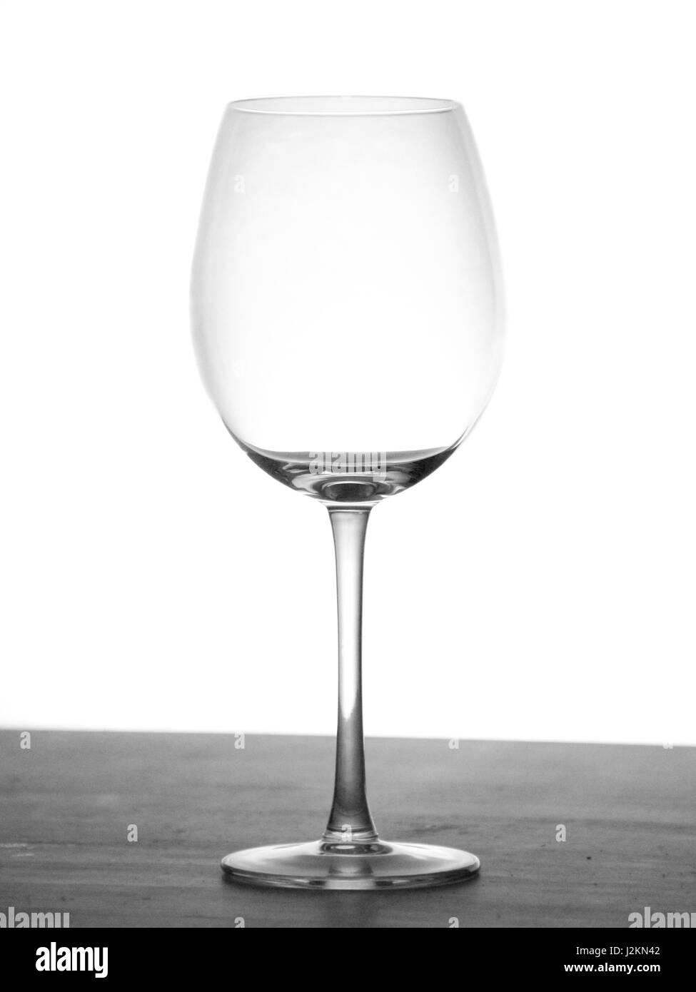 Still of a glass with background light. Simple water glass. Simple wine ...