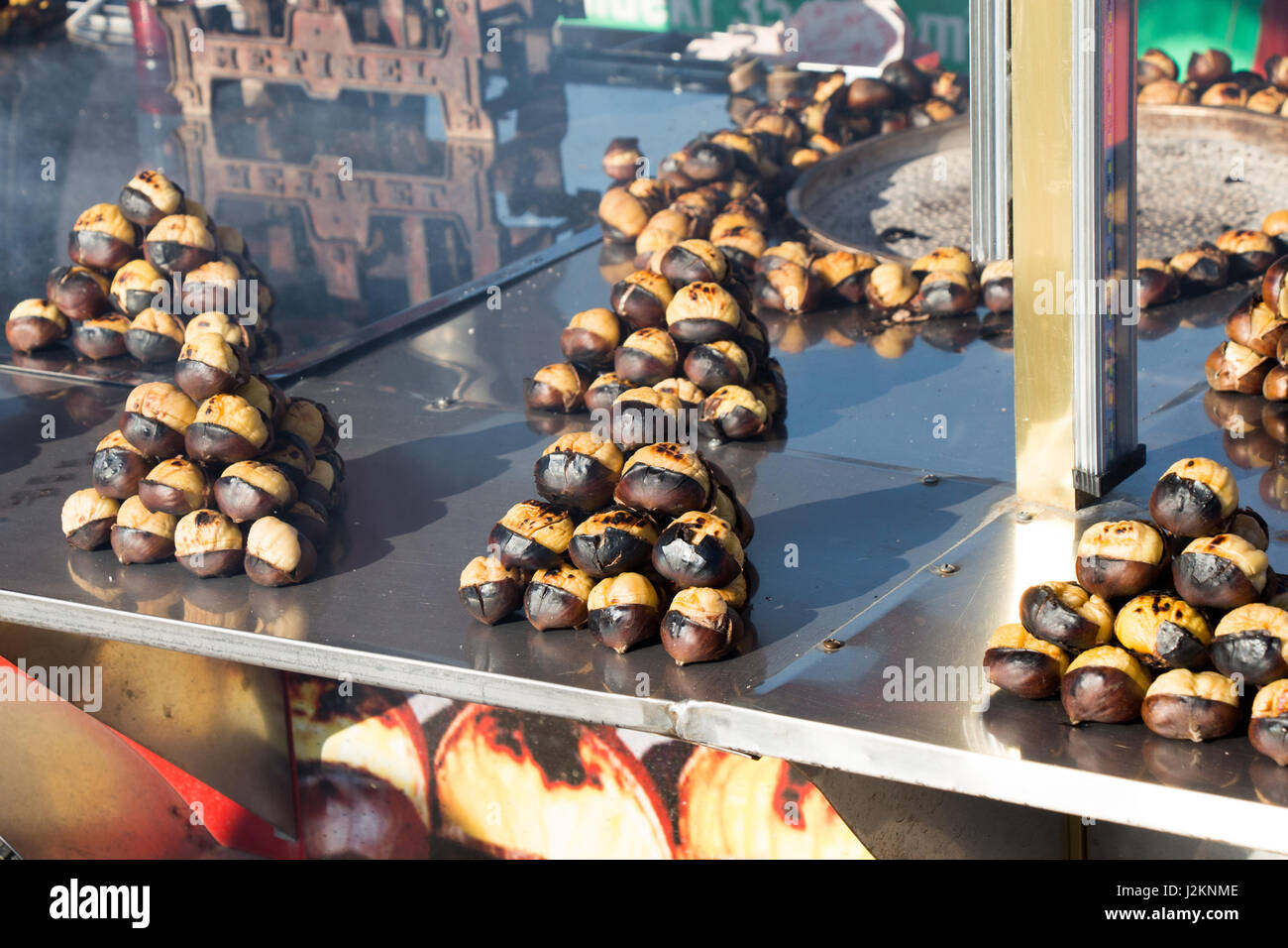 Roasted chestnuts cooked over fire hi-res stock photography and images ...