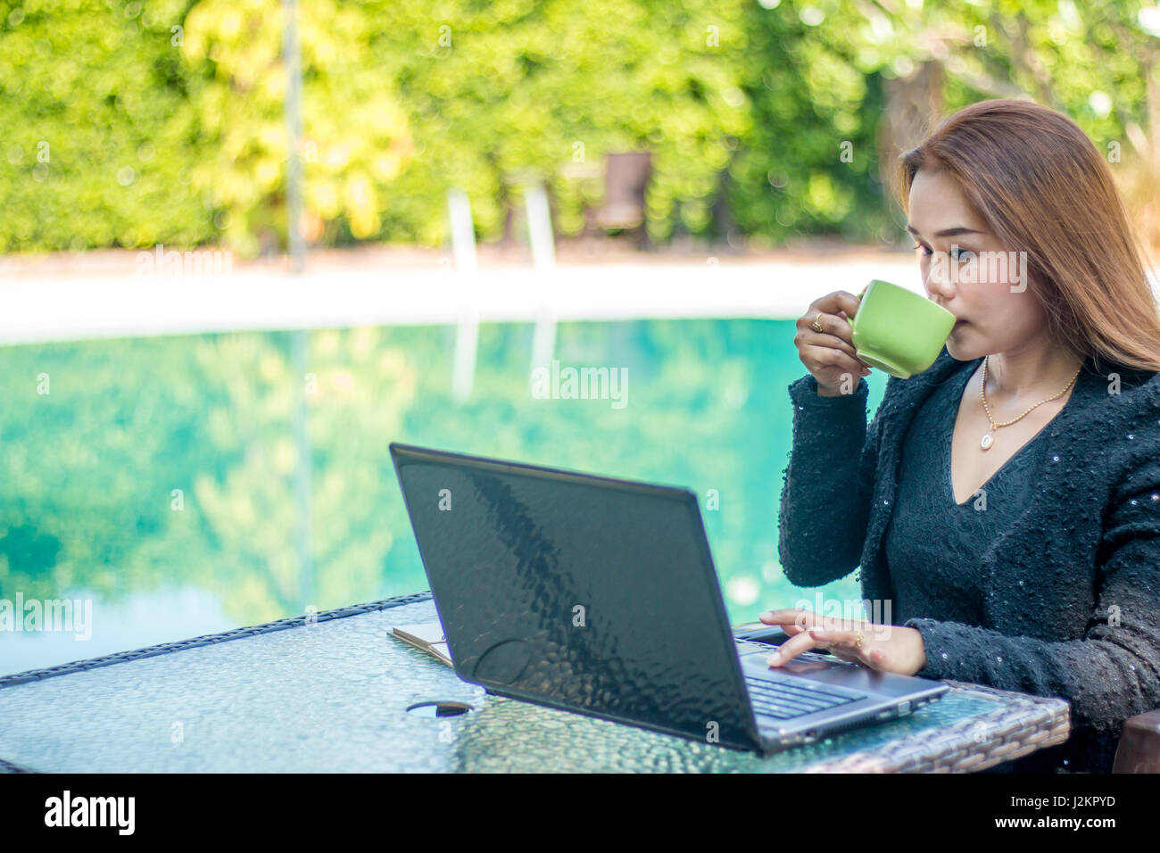 Beautiful young woman sips coffee hi-res stock photography and images ...