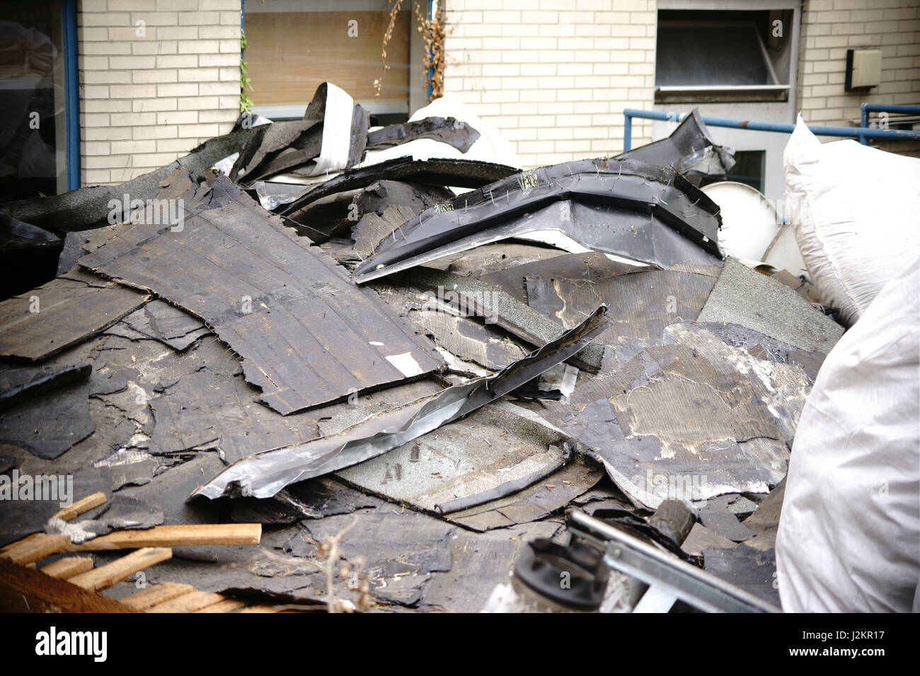 The close-up of debris from rubble and the false ceiling and and the ...