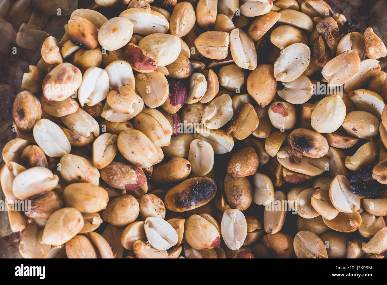 Peanuts roasted dark vintage Stock Photo - Alamy