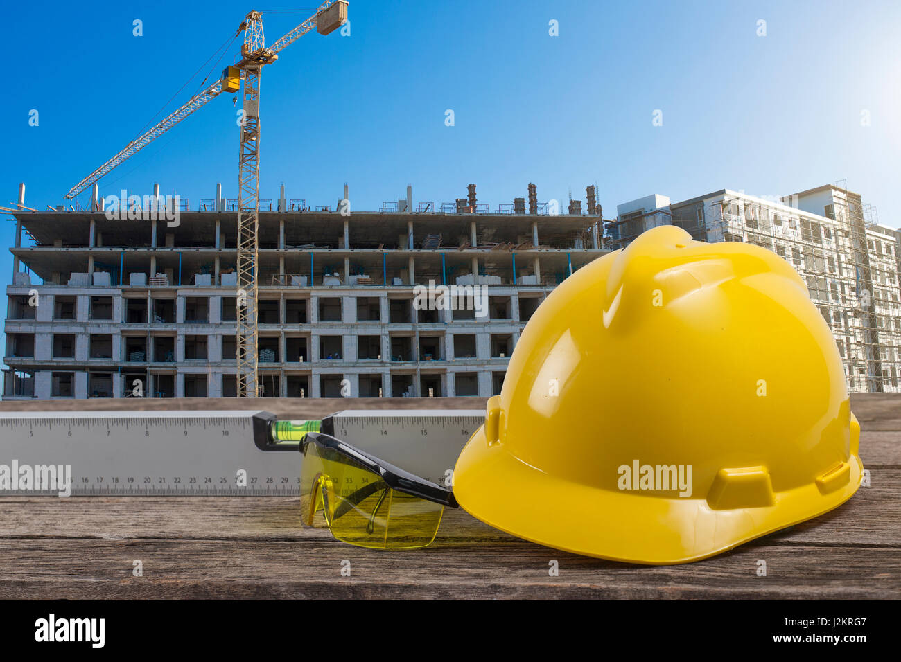 engineer working table plan at building construction site Stock Photo ...