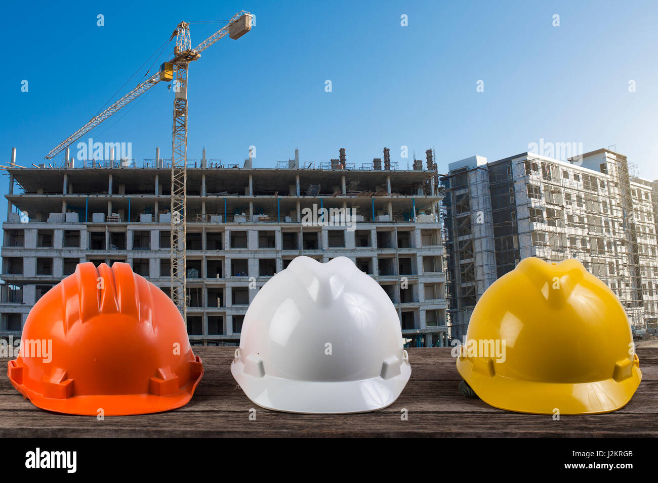 engineer working table plan at building construction site Stock Photo ...