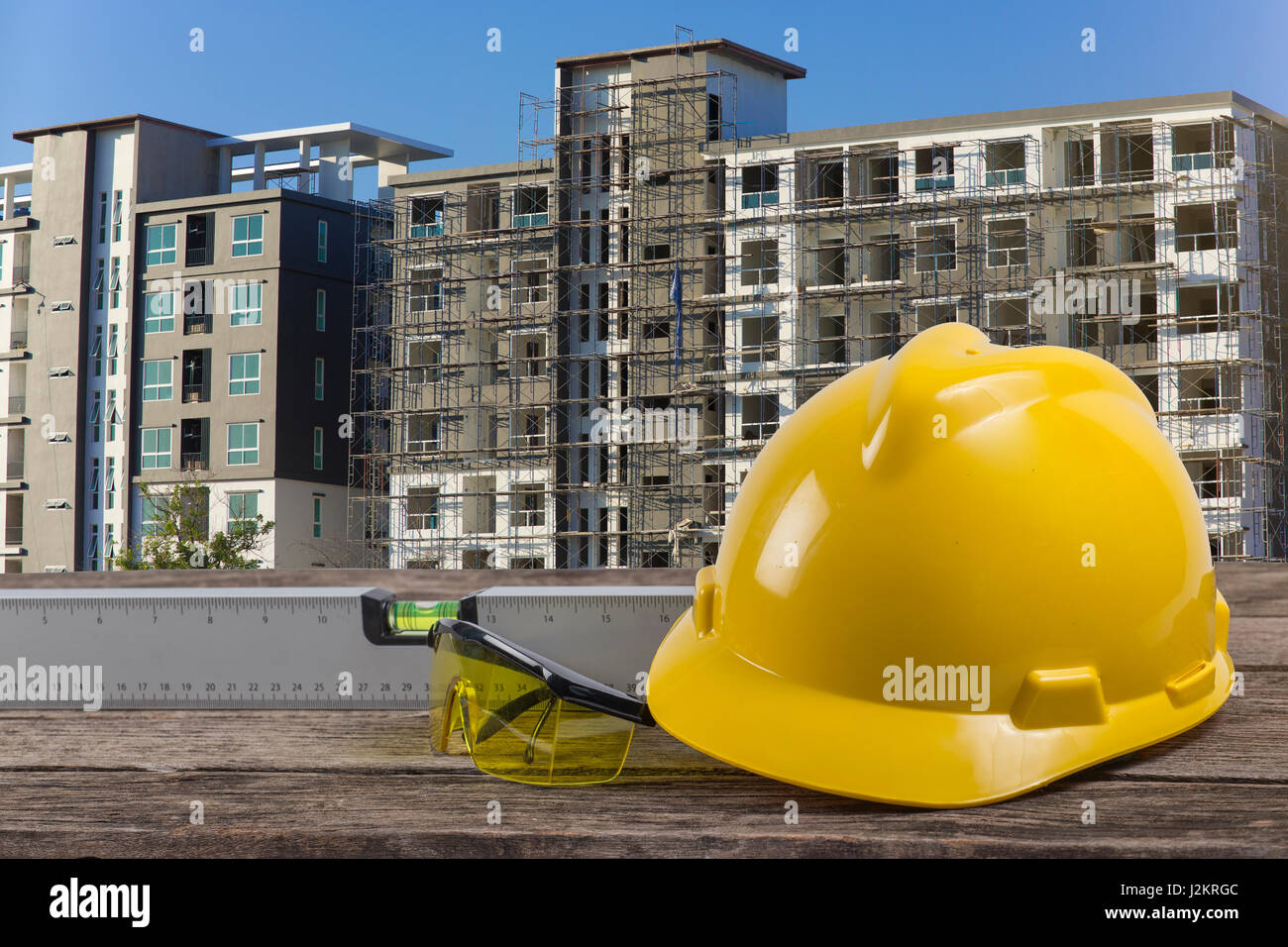 engineer working table plan at building construction site Stock Photo ...