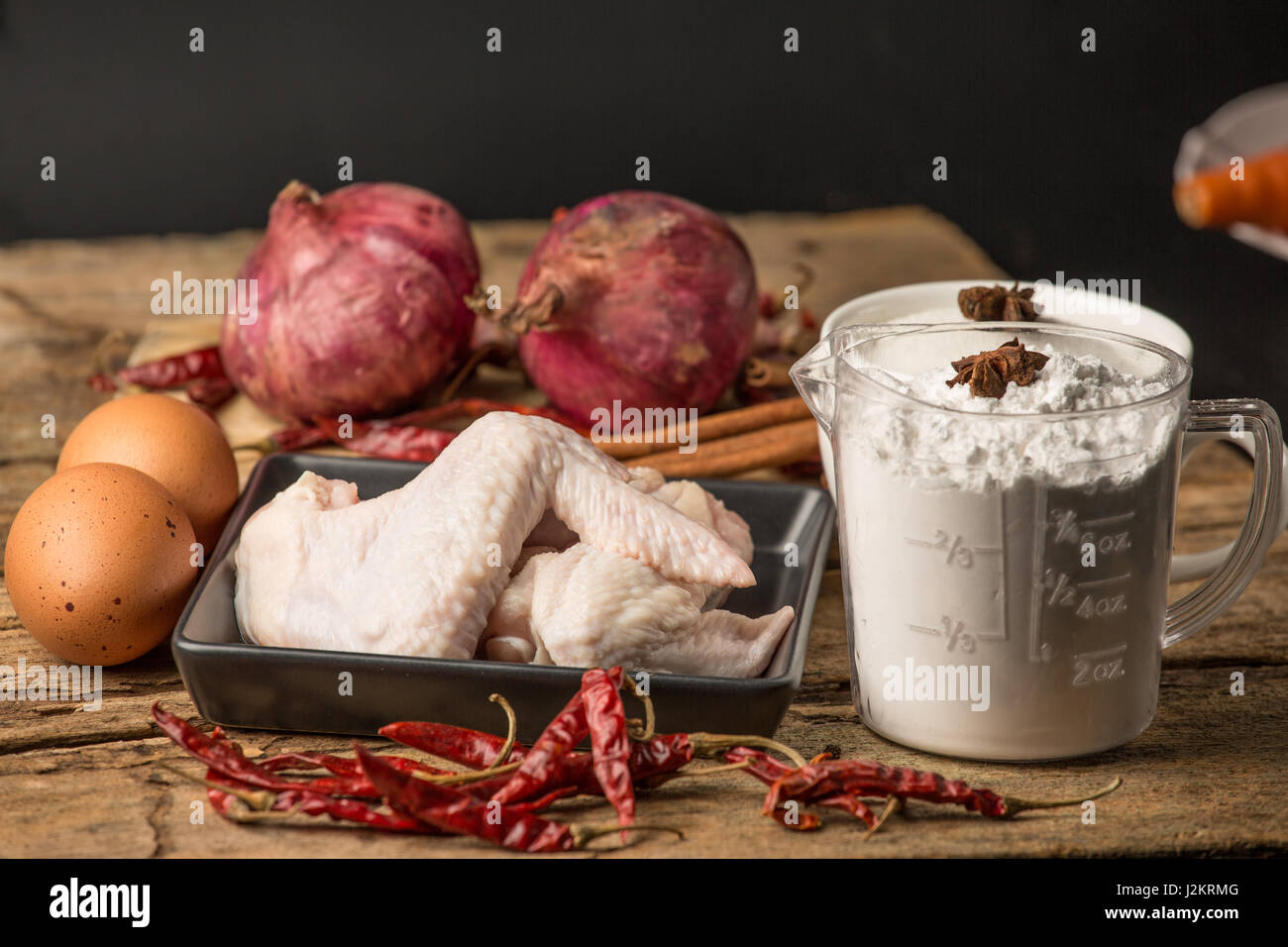 aw chicken wings with spices - ready for cooking Stock Photo - Alamy