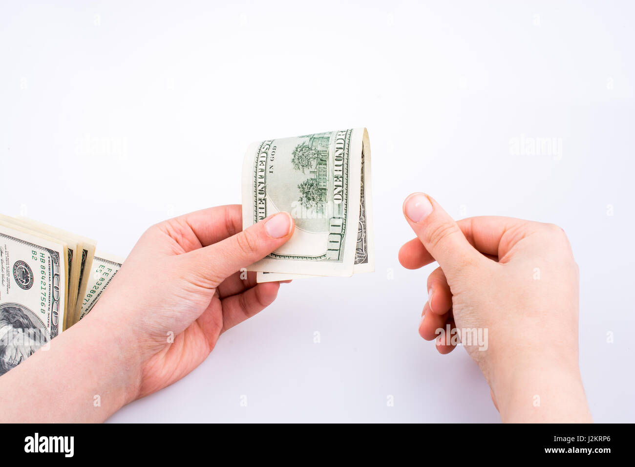 Human hand holding American dollar bill as money isolated on white ...
