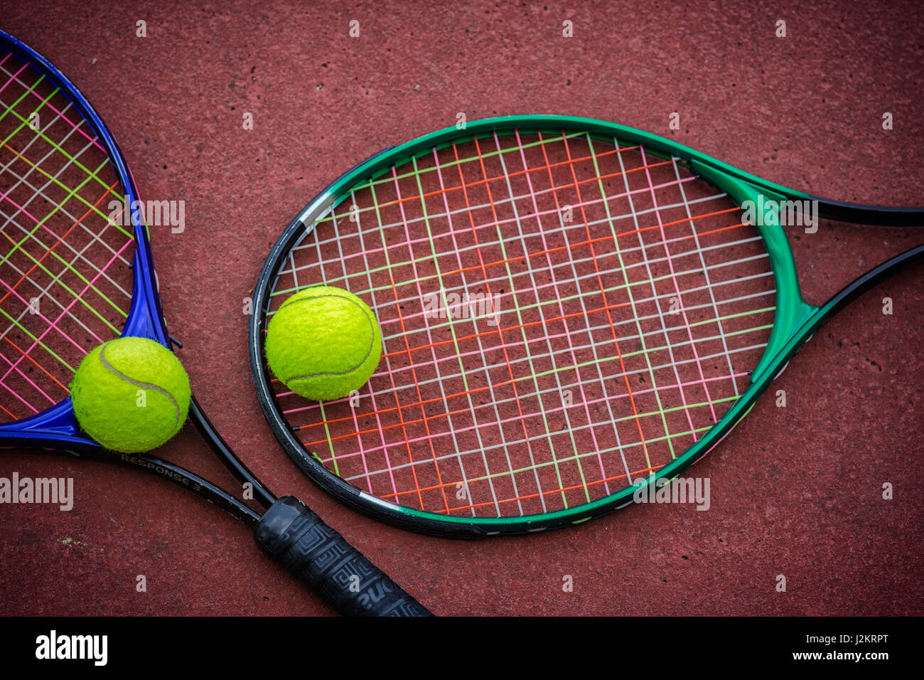 tennis racket and balls on the tennis court Stock Photo - Alamy
